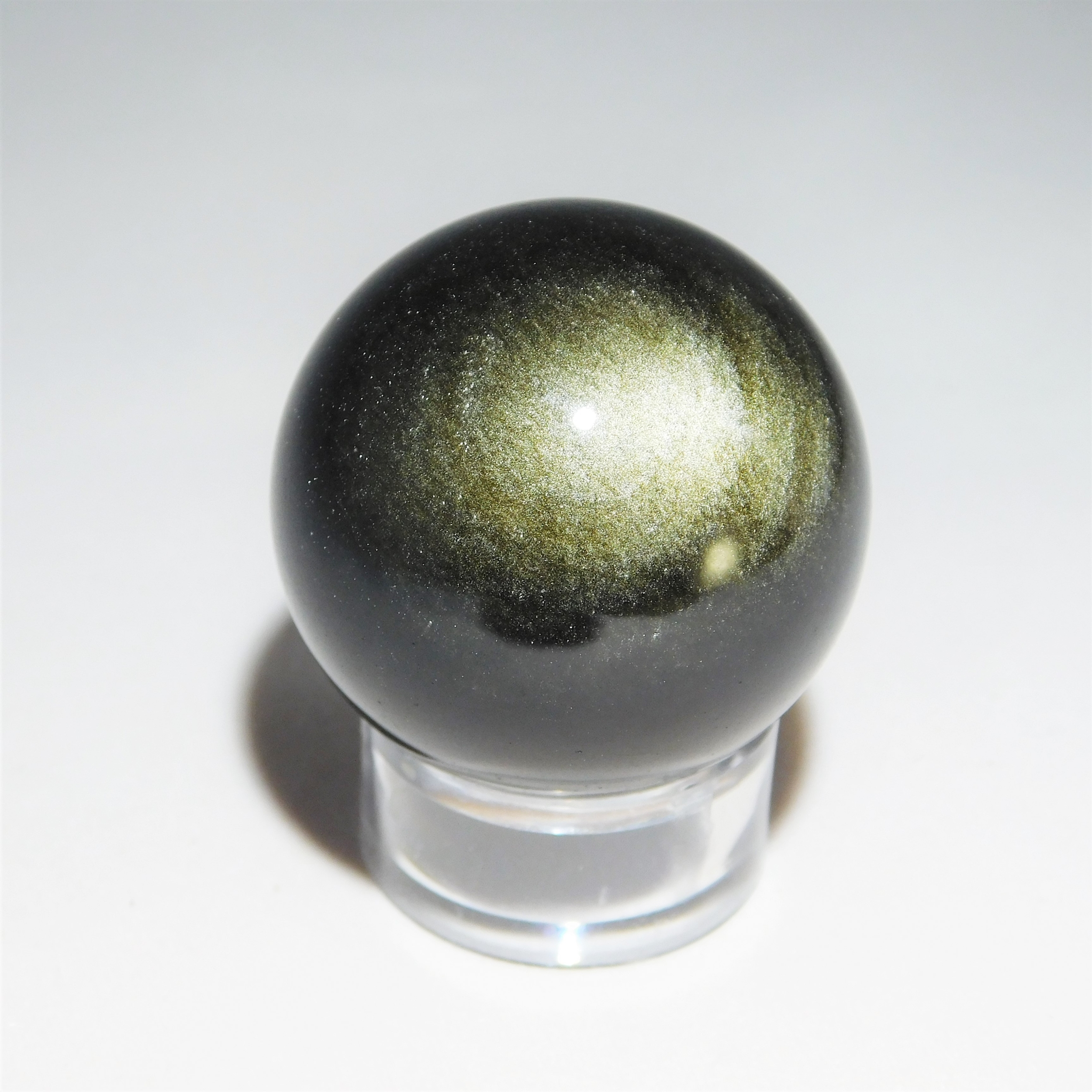 Golden Sheen Obsidian Sphere – The Amethyst Moon